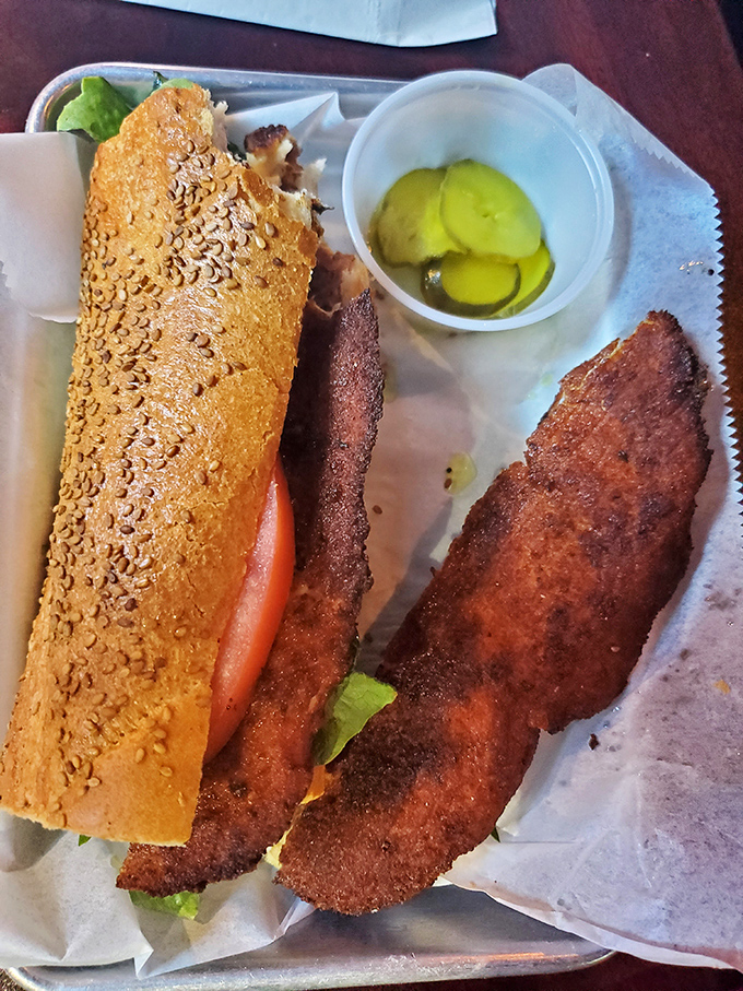 The chicken cutlet sandwich – where breaded perfection meets fresh vegetables in a handheld masterpiece that puts desk lunches everywhere to shame.