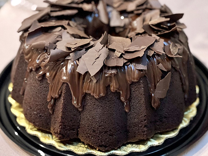 A chocolate bundt cake wearing chocolate like a couture gown—elegant, excessive, and exactly what your day needs.