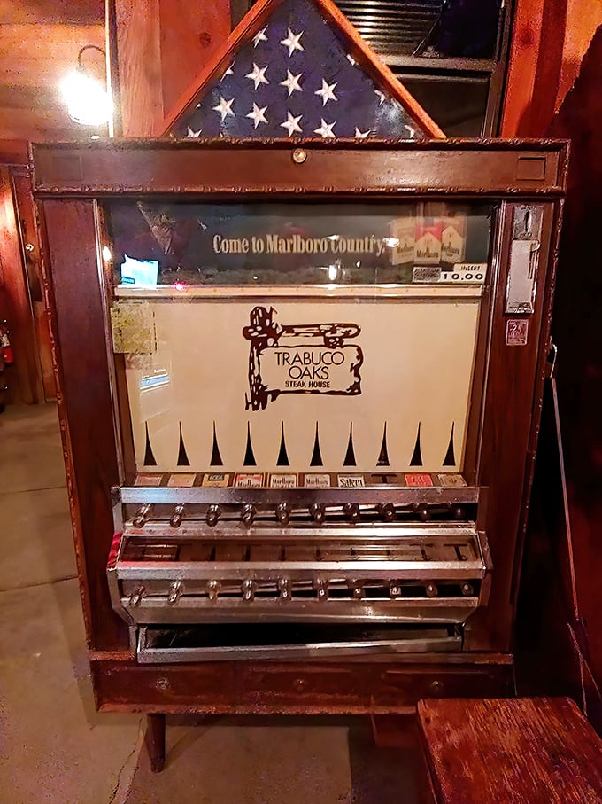 Even the vintage cigarette machine speaks to another era—a time capsule detail in a place that honors the past while serving the present.