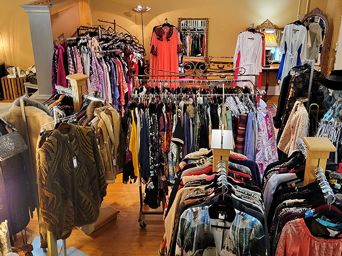 Vintage clothing racks burst with color and pattern—each garment a chance to own fashion history without the mothball smell.