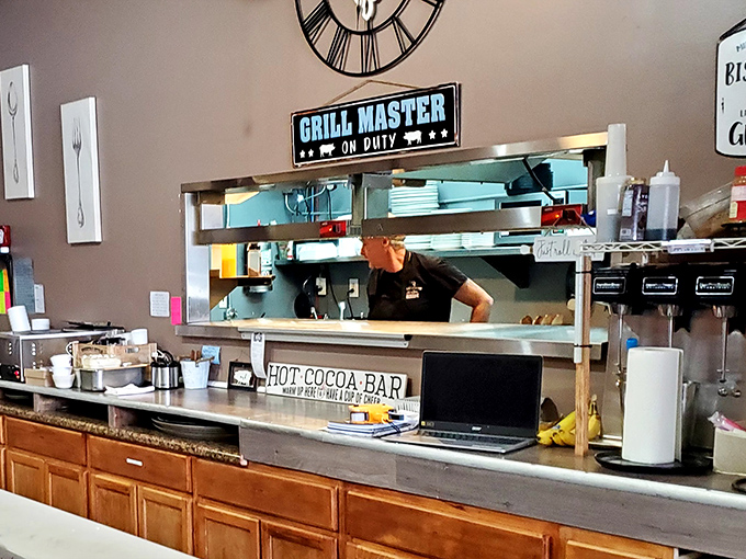 "Grill Master on Duty" isn't just a sign—it's a promise. The open kitchen shows they have nothing to hide and everything to be proud of.