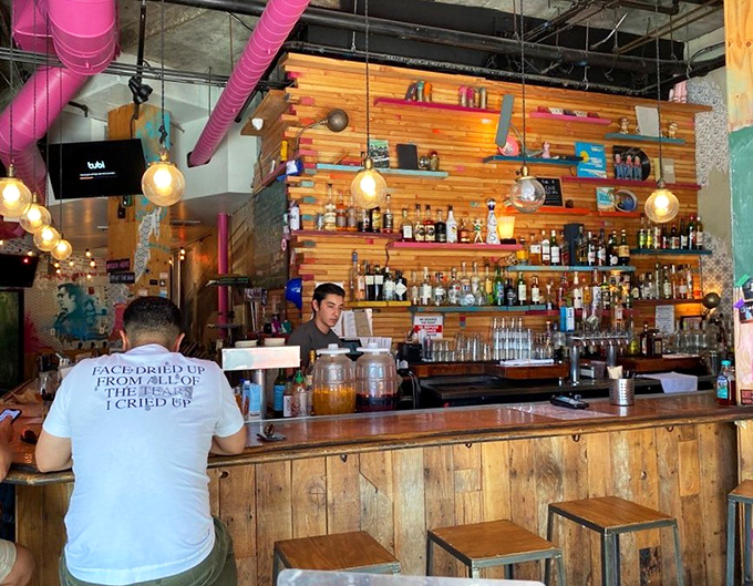 Where the magic happens – a bar that promises liquid refreshment with the same creative spirit that infuses the food menu.