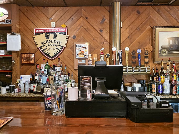 The bar area displays traditional German beer barrels like trophies of authentic brewing heritage.