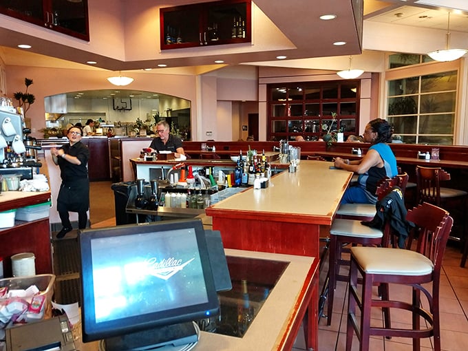 Where breakfast magic happens – the counter offers front-row seats to the culinary choreography of morning meal mastery.