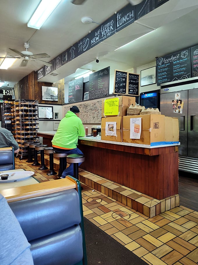 The counter—where solo diners find community and regulars get the inside scoop on daily specials before they hit the board.