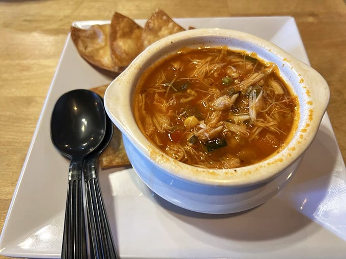 This isn't just soup – it's a swamp symphony in a bowl, where crab and spices perform a culinary duet that makes you want to applaud between spoonfuls.