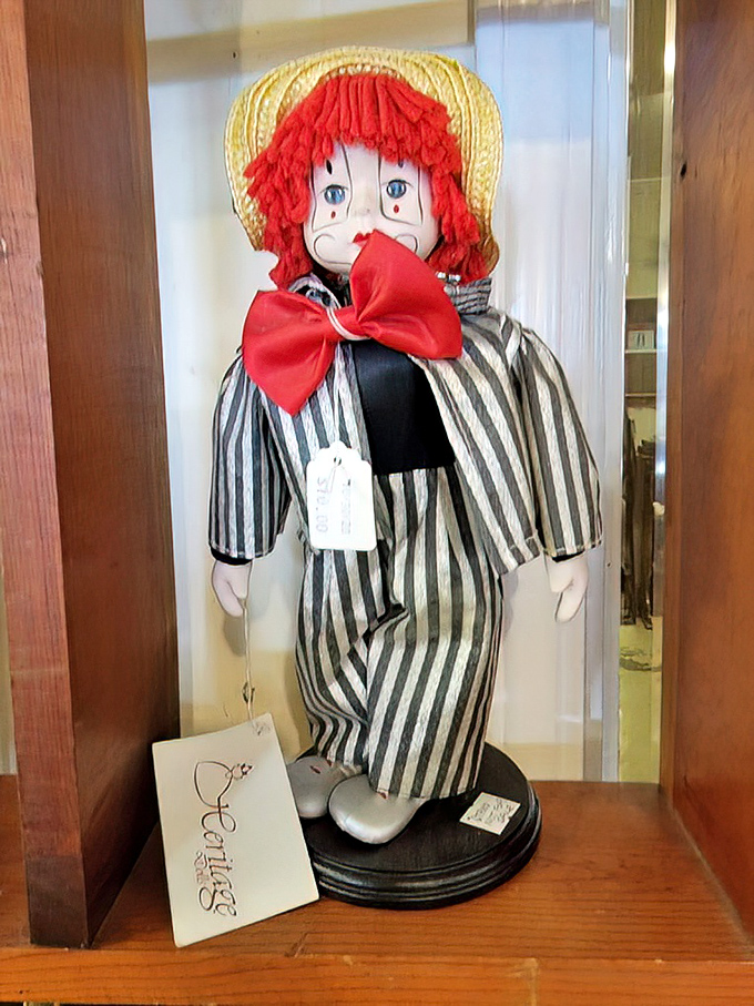 A doll that somehow manages to be both charming and slightly unsettling. This red-haired fellow has definitely seen things during his lifetime of watching.
