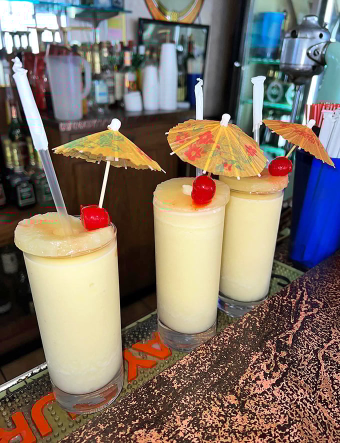 Piña coladas with paper umbrellas and pineapple garnish—vacation in a glass, even if you're just on lunch break.
