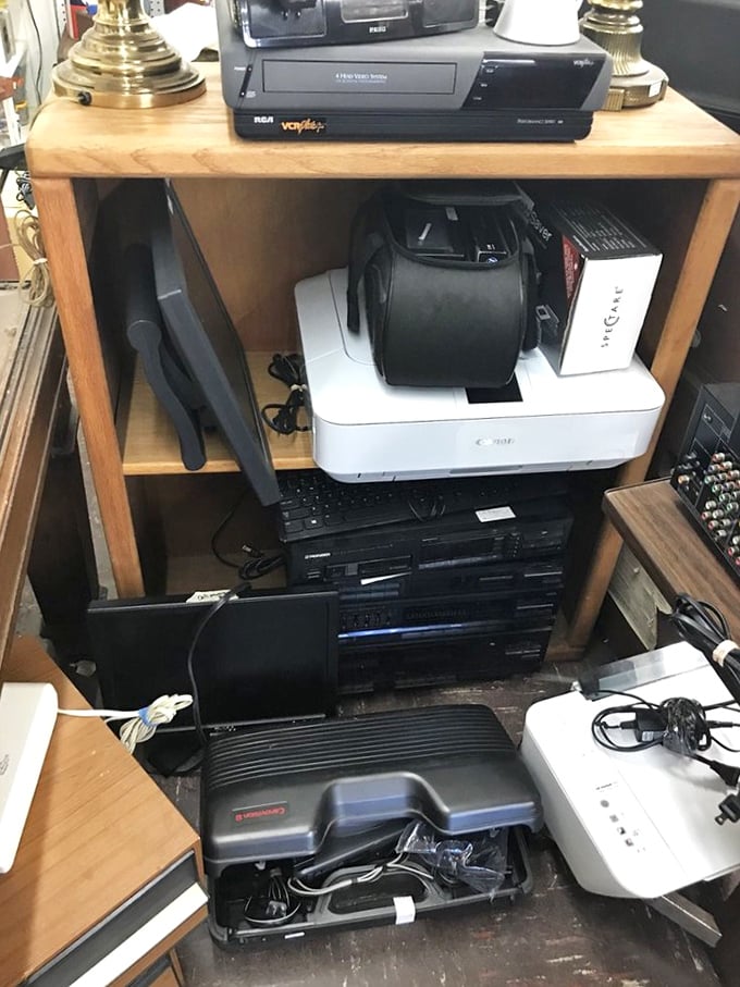 The electronics graveyard—where yesterday's cutting-edge technology comes to find new purpose. That VCR might just be someone's retro dream machine!