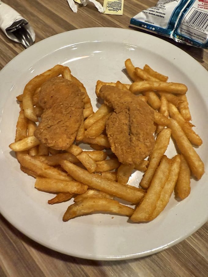 Golden-fried perfection surrounded by a moat of crispy fries. Some meals don't need fancy descriptions – they just need to be eaten immediately.