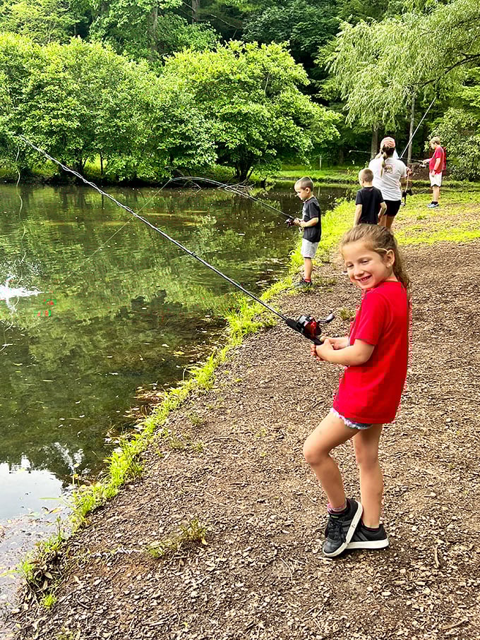 Young anglers discovering the timeless joy of fishing—where catching nothing still somehow counts as a perfect afternoon.