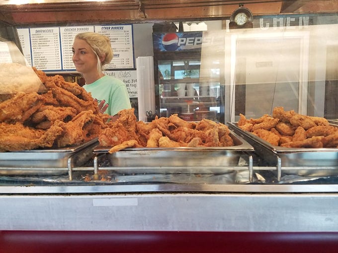 Mountains of golden fried chicken waiting for their forever homes. Adoption rates are high at this establishment.