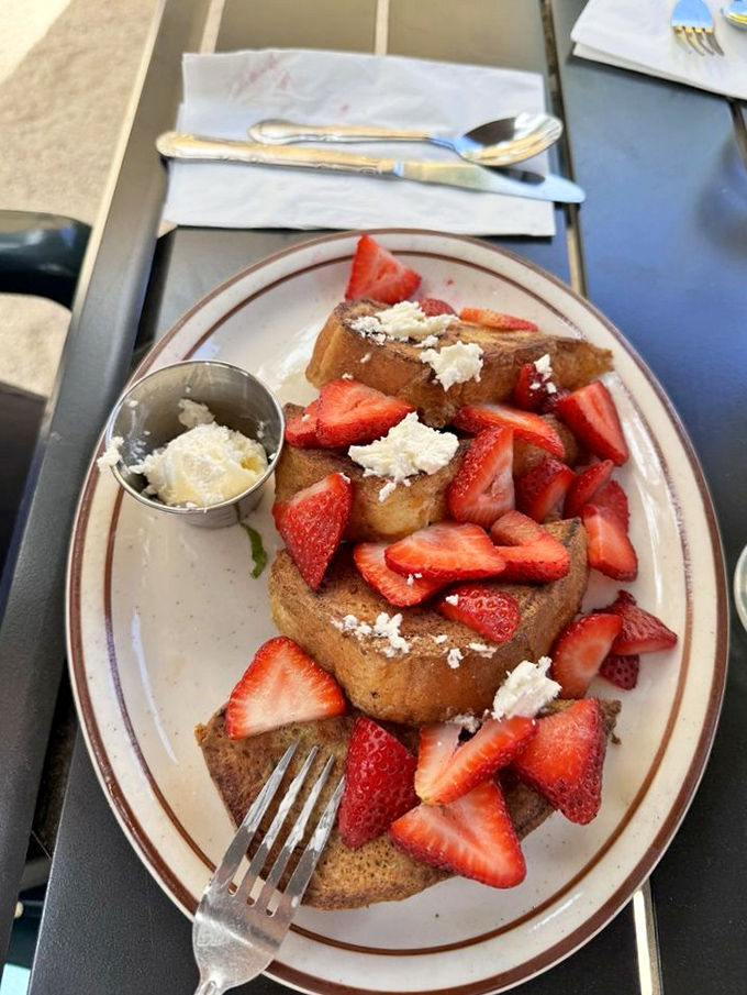 French toast that renders adults speechless – strawberries and cream transforming bread into something transcendent.