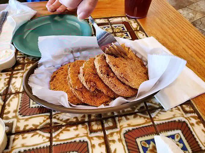 Fried green tomatoes that would make Fannie Flagg proud. Crispy, tangy Southern tradition served with a side of nostalgia.