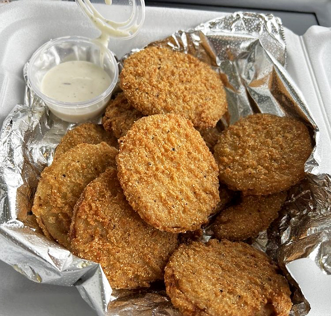 Fried green tomatoes with a golden crust that shatters just right—tangy treasures that make you wonder why green tomatoes ever bother ripening.