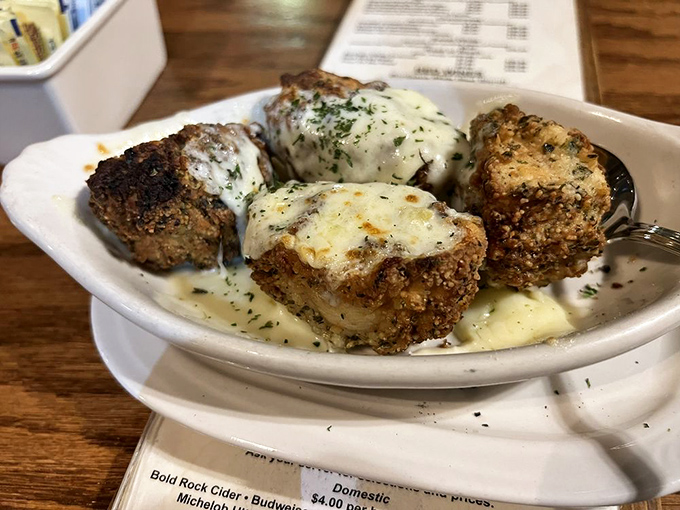 Fried mushrooms that could convert even the most dedicated fungus-phobe. That creamy sauce isn't just a condiment—it's a philosophy.