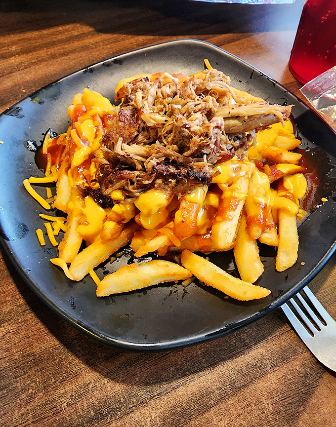 Mac and cheese fries topped with pulled pork? This isn't just comfort food—it's comfort food that went to graduate school and came back with big ideas.