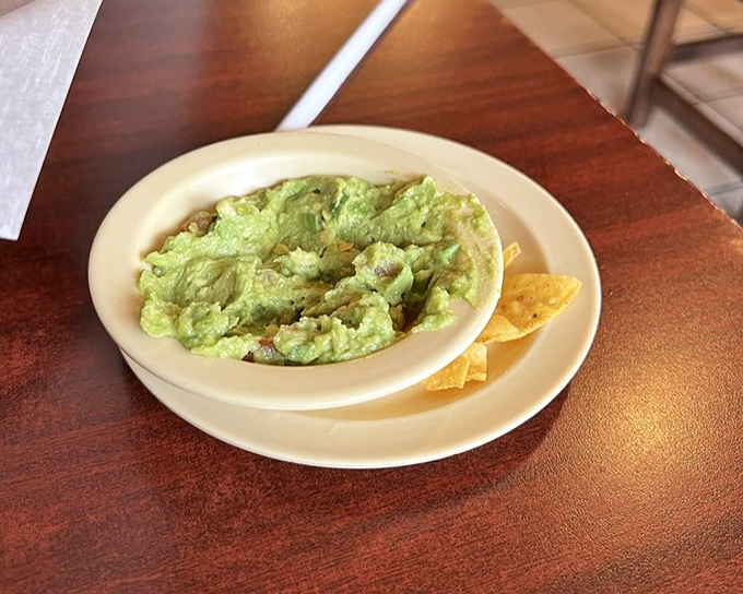 Guacamole so fresh it makes you wonder if there's an avocado tree out back. This isn't just a dip—it's the green gold that justifies the extra charge. 