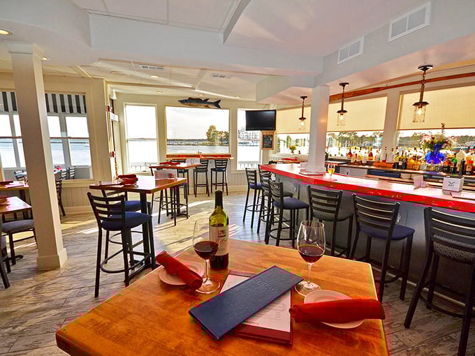 The dining room isn't just a place to eat—it's where memories are made, one crab cake at a time, with water views that remind you exactly where your food came from.