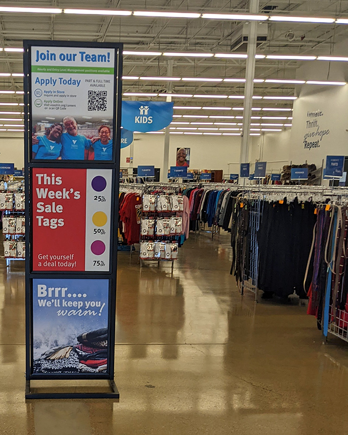The "Join our Team" sign reveals the color-coded tag system, the Rosetta Stone for serious thrift shoppers.