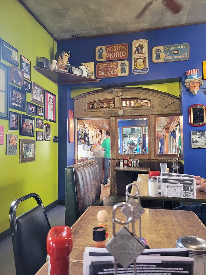 Vintage memorabilia and colorful walls create an atmosphere where every meal feels like a celebration of Americana.