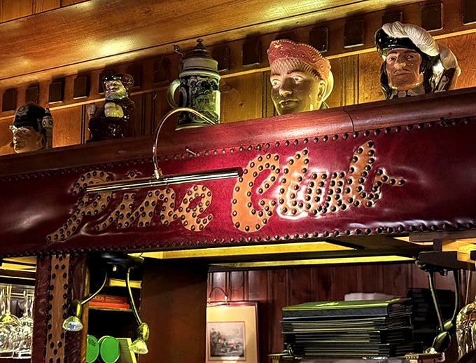 That studded leather bar sign isn't just decor—it's a statement piece that's witnessed decades of celebrations, deals, and first dates.