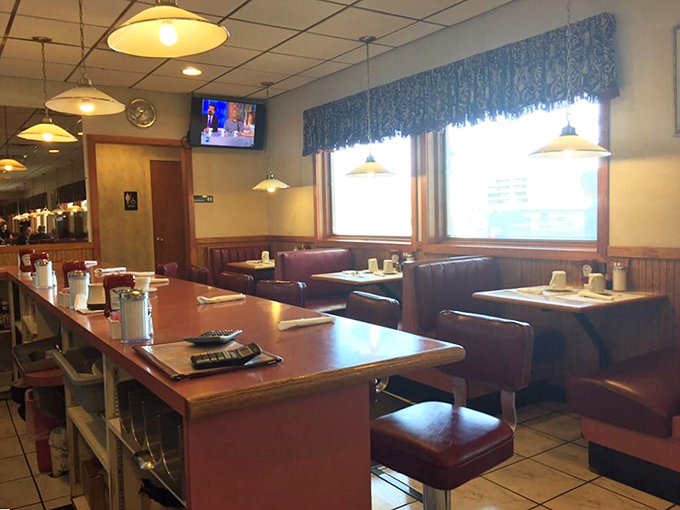 Counter seats and booths, the chess pieces of diner strategy—each with their own advantages depending on your coffee consumption goals.