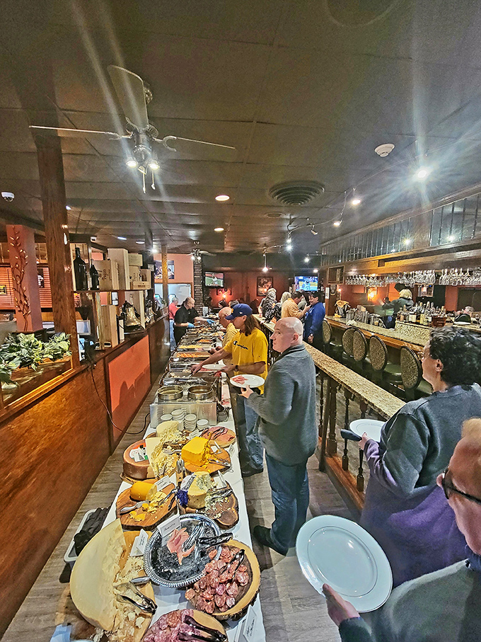 The bustling buffet line proves that Station Square knows how to throw a spread. Those platters aren't just food—they're edible community builders.