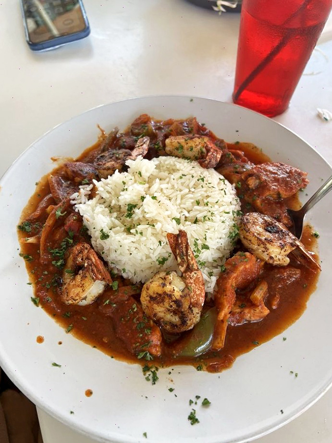 Jambalaya that brings New Orleans to Florida—a spicy, saucy masterpiece with plump shrimp circling a perfect island of jasmine rice.