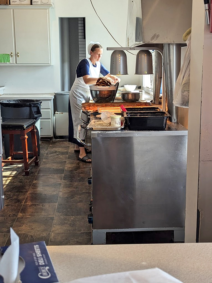 A glimpse into the working kitchen—where old-world techniques meet fresh ingredients. No fancy gadgets, just skill and tradition.