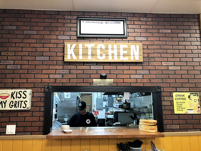 The kitchen pass—where "Kiss My Grits" isn't just a Flo reference but a genuine culinary philosophy worth embracing.