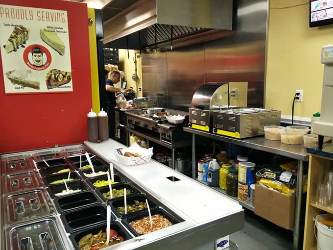 The open kitchen isn't just for show—it's dinner and a performance where hot dogs are the headlining act and toppings are the supporting cast.