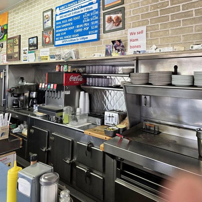 The kitchen at Mike's – where stainless steel meets decades of experience in the art of ham perfection.