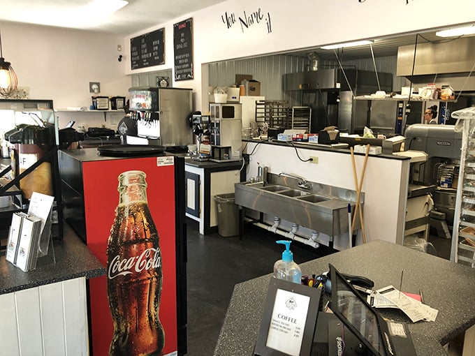 The kitchen where the magic happens—stainless steel and efficiency, the backstage to the sweet symphony out front.
