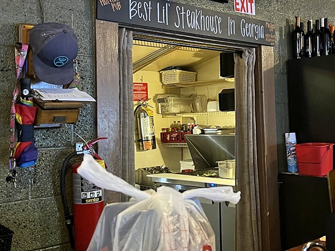 "Best Lil' Steakhouse in Georgia" isn't just a sign—it's a promise. A peek into the kitchen reveals where the carnivorous magic happens.