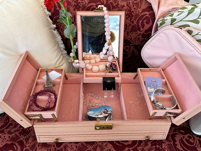 A jewelry box that's seen more treasure than some pirates. Those compartments are just waiting to organize your accessories collection.