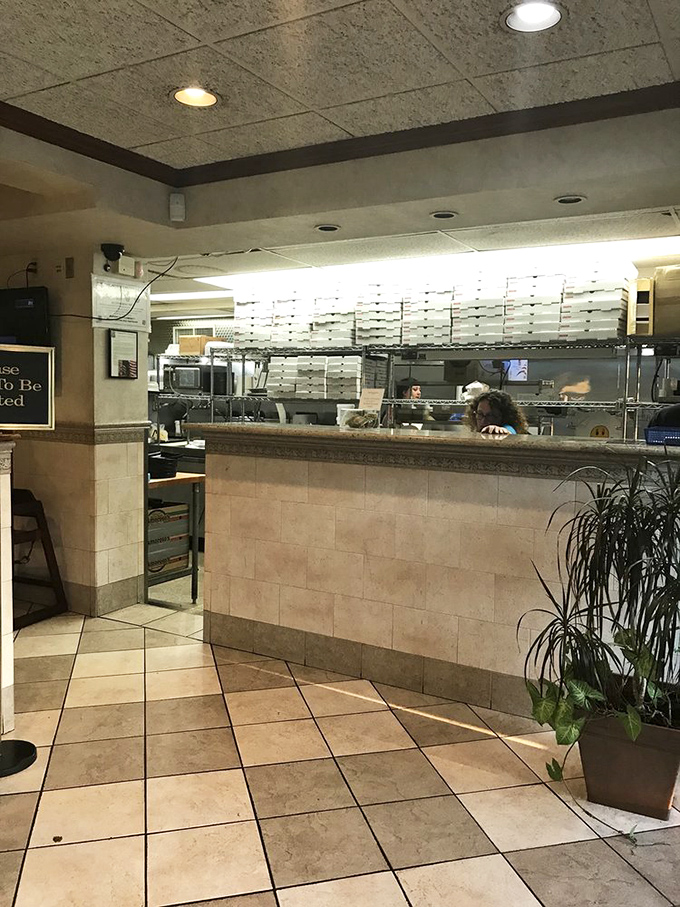 Behind this counter, culinary magic happens with the efficiency of a NASCAR pit crew and the precision of Swiss watchmakers.