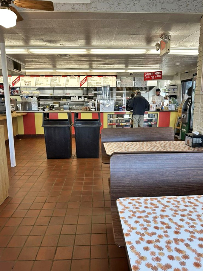 The order counter—where dreams come true and diet plans go to die, all with the efficiency that comes from decades of practice.