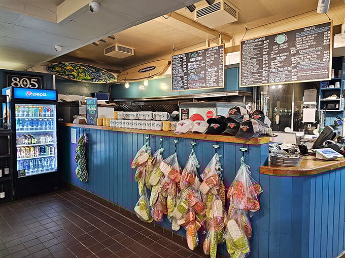 The ordering counter – where dreams become reality and indecision becomes someone else's problem. Choose your seafood destiny!