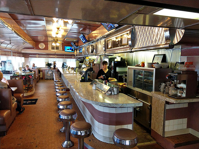 The long counter stretches like a runway for breakfast fashion – where plates of eggs and toast make their grand entrance.