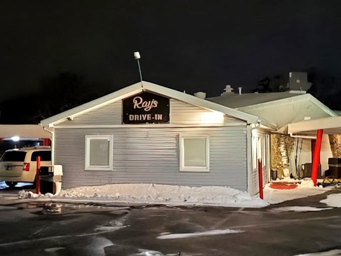 Evening lights transform this humble spot into a beacon for anyone seeking authentic comfort food experiences.