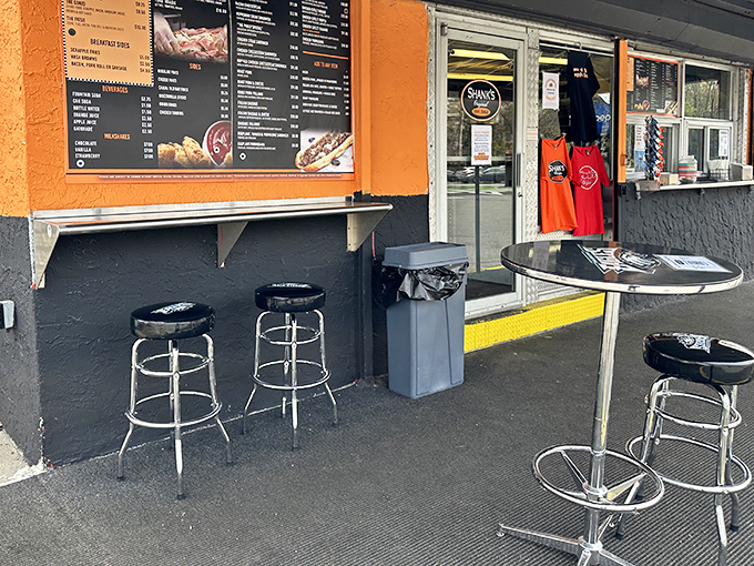 That bright orange umbrella isn't just for shade—it's a beacon calling hungry souls to sandwich salvation on the Delaware waterfront.