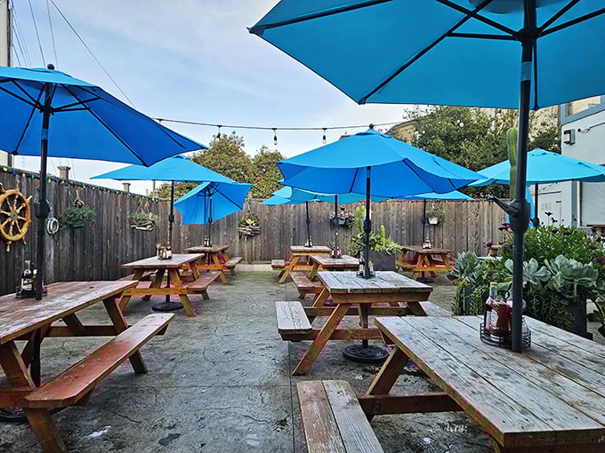 Blue umbrellas dot the outdoor seating area like pieces of sky. On a sunny Monterey day, this is prime real estate for seafood enjoyment.