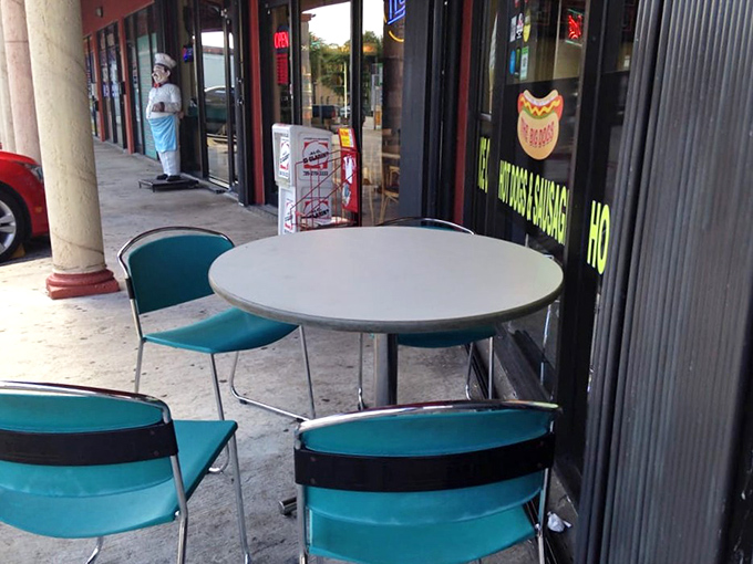 Miami's perfect weather deserves outdoor seating. These turquoise chairs aren't just furniture—they're front-row seats to people-watching with a side of deliciousness.