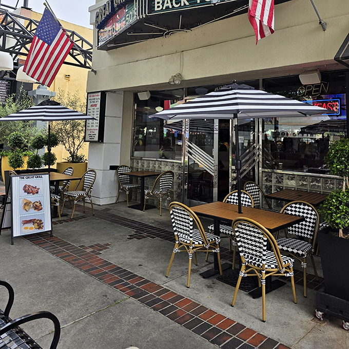 Outdoor seating provides a front-row view of Burbank life. Black and white checkered chairs invite you to enjoy California sunshine with your comfort food.