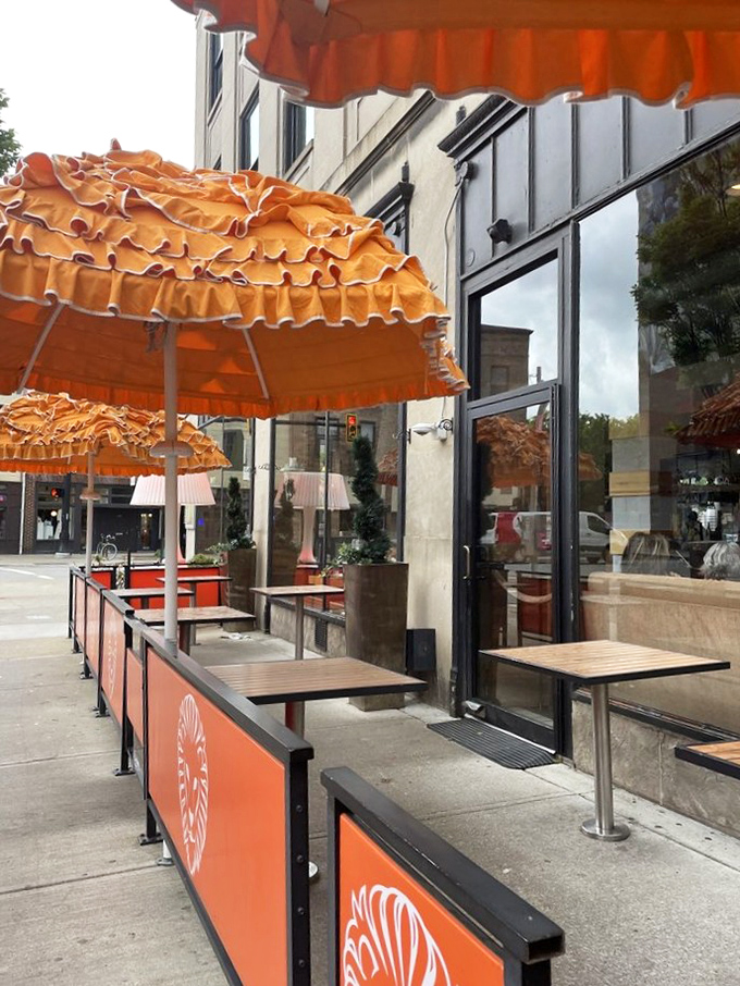 The outdoor patio—where Columbus summer dreams come true. Those distinctive orange umbrellas could be spotted by hungry pizza lovers from space.