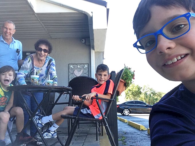 The outdoor seating area—where families create memories over pancakes that will someday make their children nostalgic for "that place in Naples."