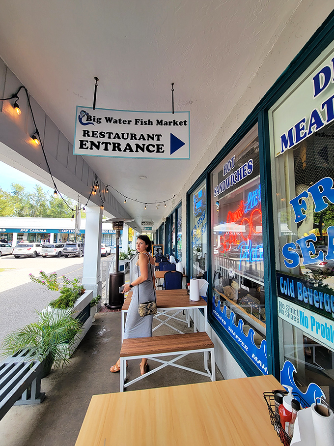 Even the outdoor seating says "Florida casual"—a place where sandy feet are welcome and seafood cravings are satisfied under the gentle shade of the awning.