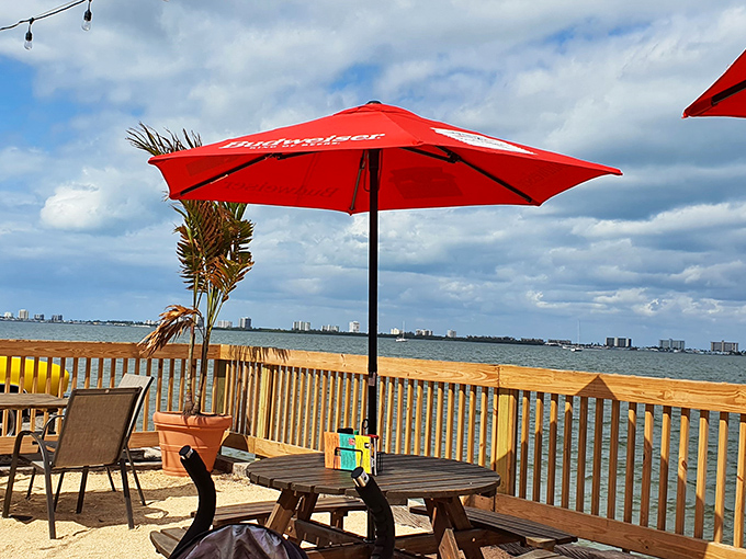 That waterfront view isn't just pretty—it's the supporting character in your meal's story, complete with dramatic cloud formations.