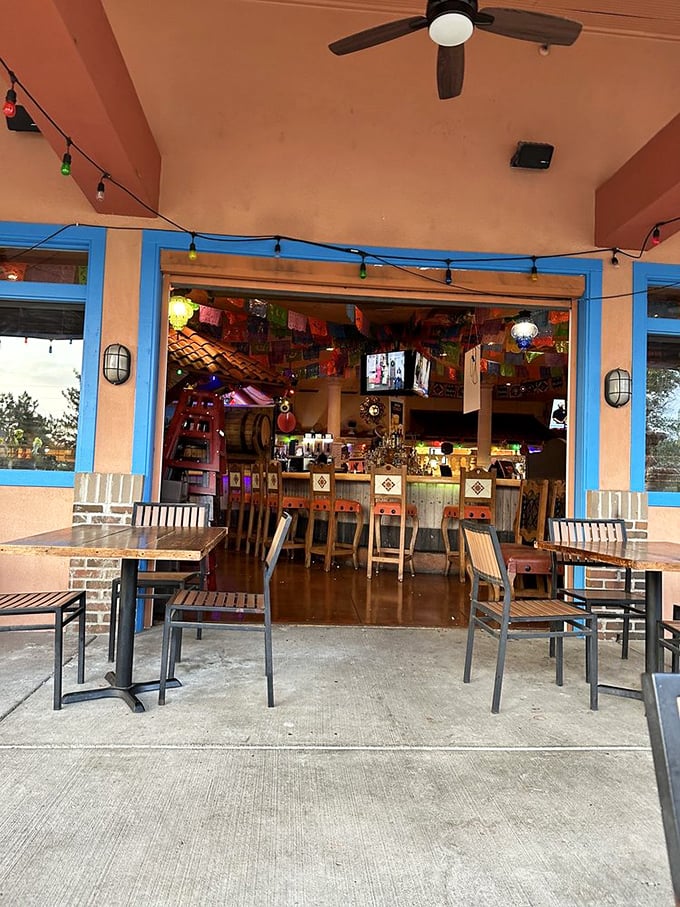 The outdoor seating area offers a perfect perch for people-watching while the colorful papel picado inside beckons you to the fiesta within.